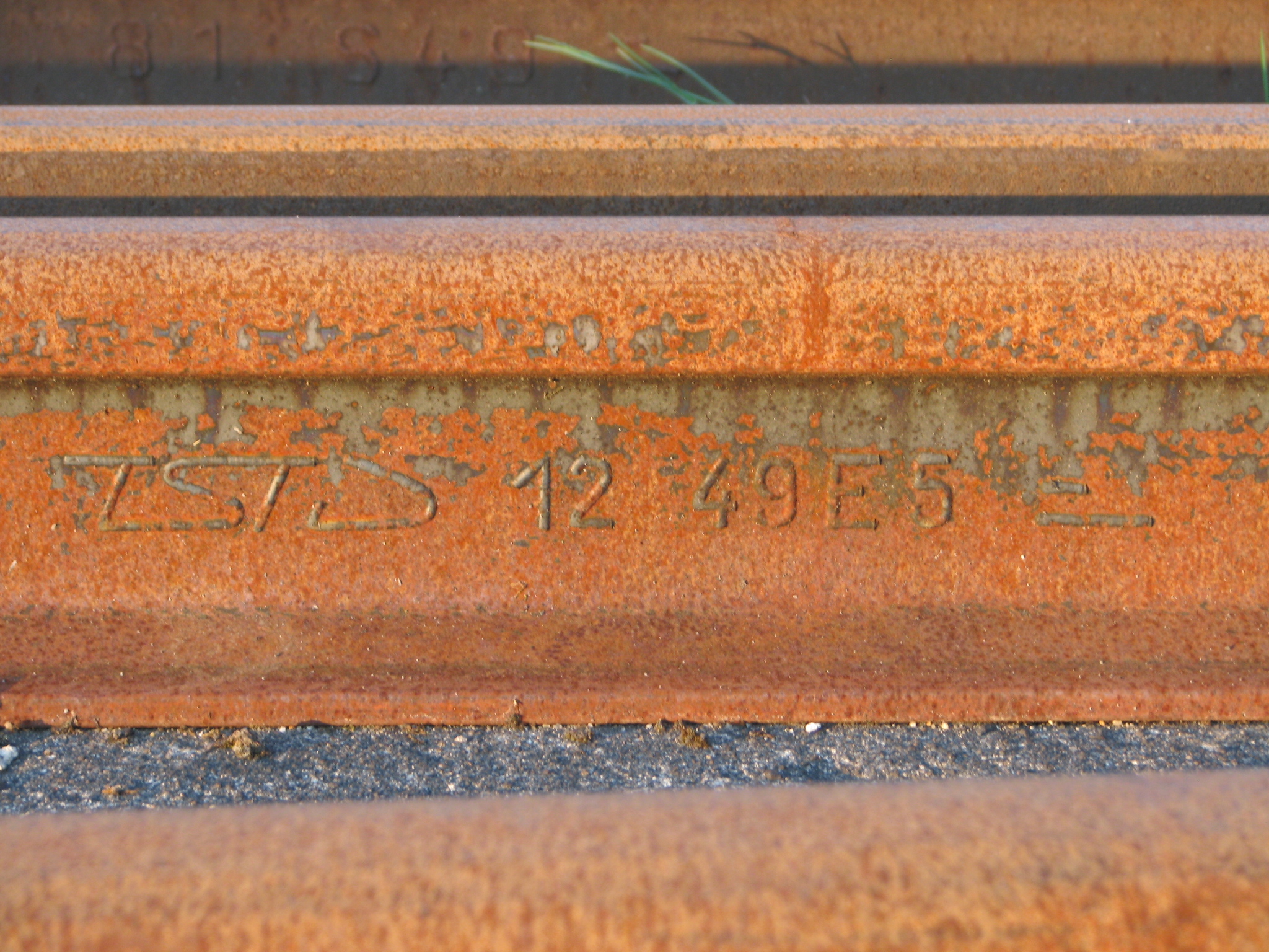 Walzzeichen: TSTG – Die Welt der Eisenbahnschienen